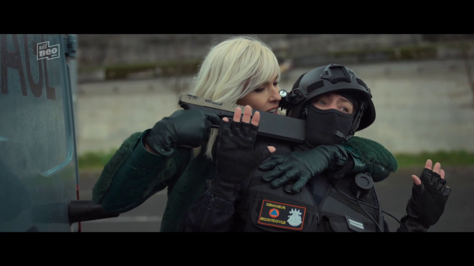 A masked female cop and two masked female bomb squad members – [Three ...